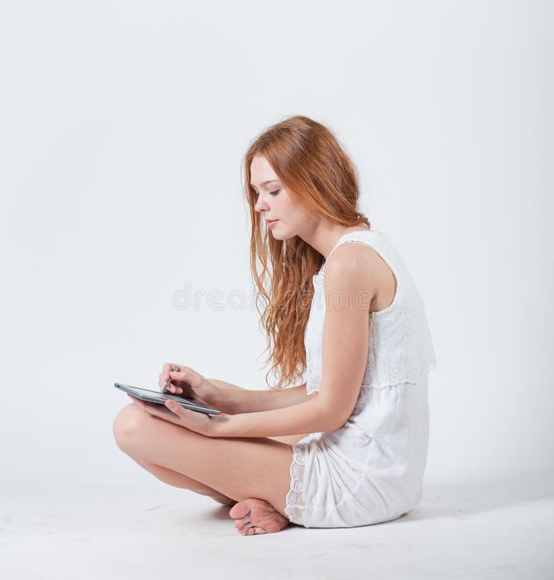 Girl with e-book stock image. Image of white, lady, reading - 20141309