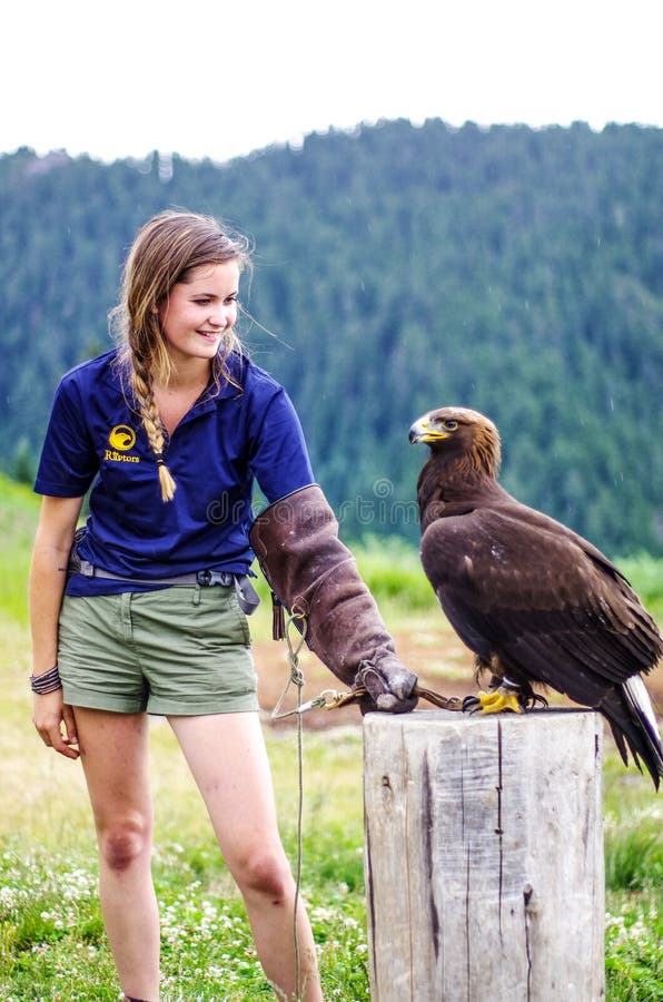 A girl and an eagle editorial stock image. Image of eagle - 83839794