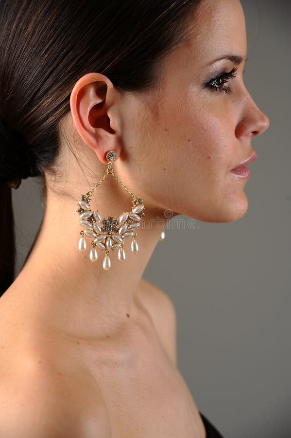 Girl with earrings stock image. Image of jewelry, brunette - 32799539