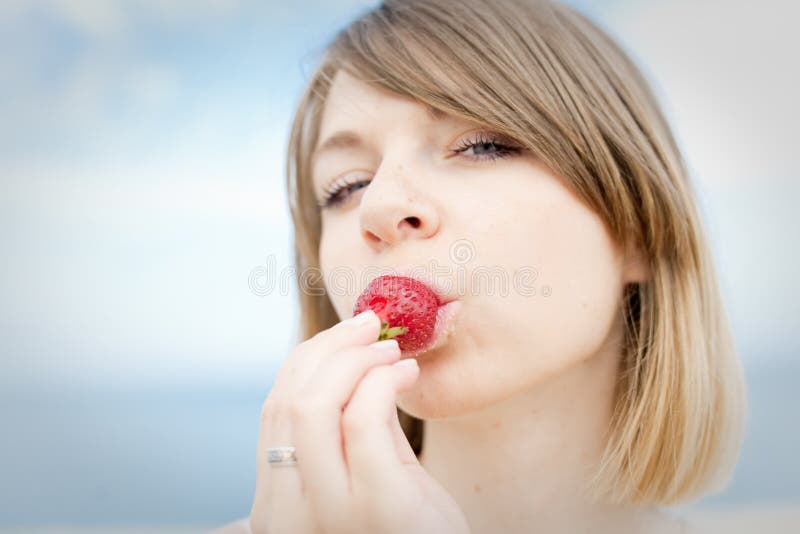 Girl eat strawberry stock photo. Image of lips, vacation - 24747458
