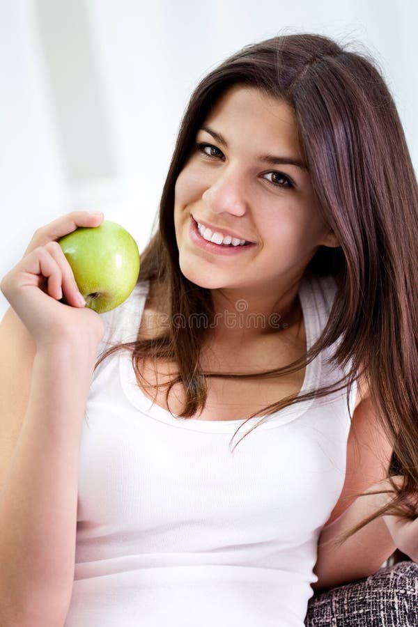 Girl eating apple stock photo. Image of lady, green, beautiful - 26731124