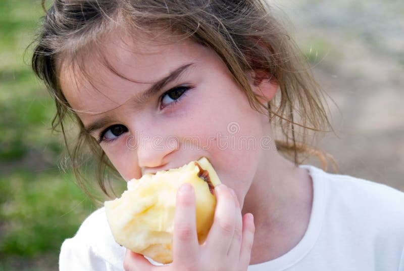 Litle Girl Eating Corn on the Cob Stock Photo - Image of face, food ...