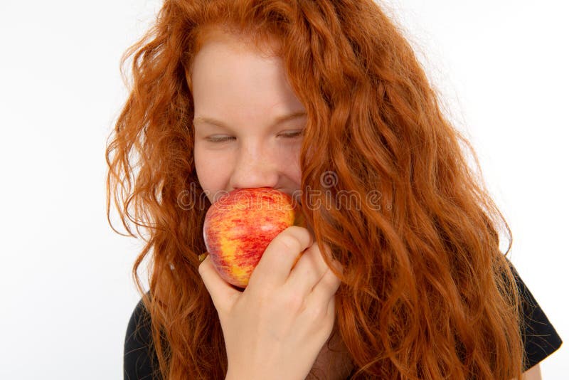 Girl eating apple stock image. Image of healthy, head - 41774555