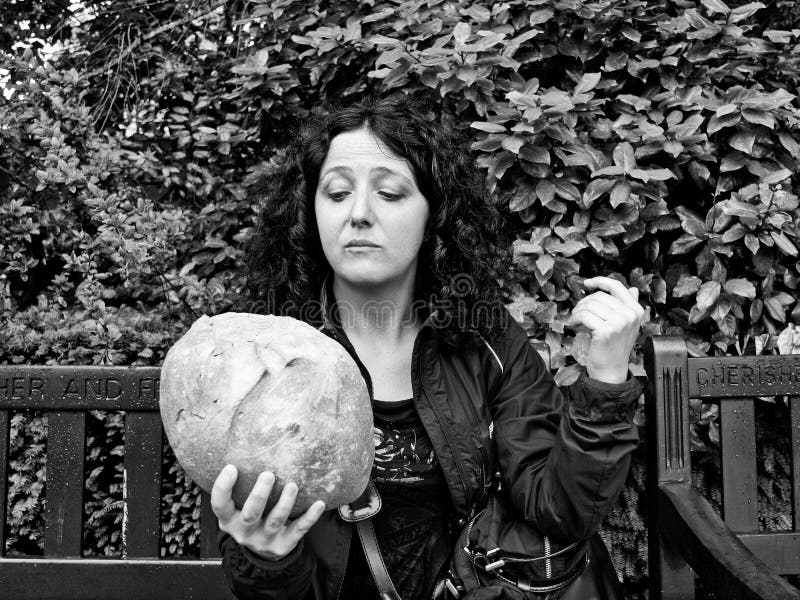 Girl eating bread stock photo. Image of female, seated - 21519004