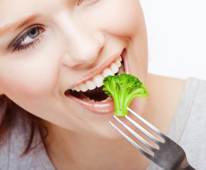 Girl Eating Broussels Sprout Stock Photo - Image of head, facial: 9937504