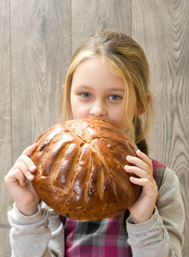 Girl eating a bun stock image. Image of hand, offspring - 36143903