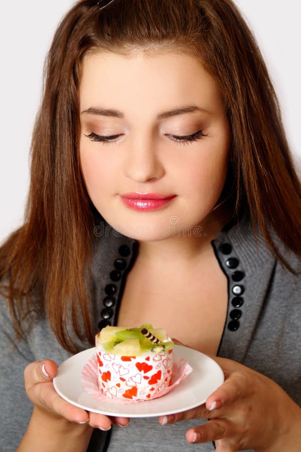 Girl eating cake stock image. Image of fresh, isolated - 12146967