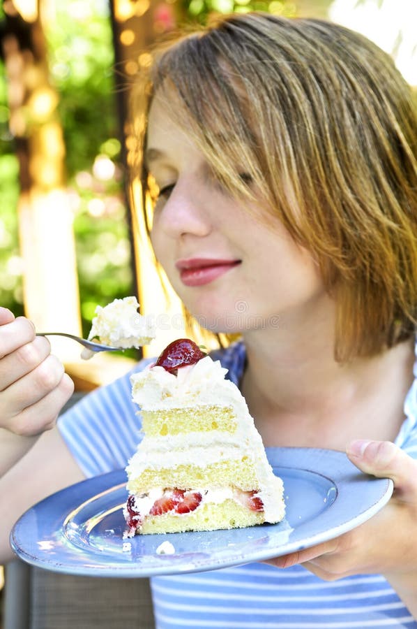 Girl eating a cake stock photo. Image of girl, female - 5871876
