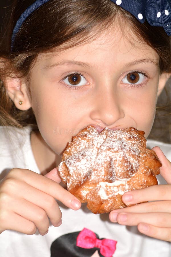 Girl eating cake stock photo. Image of cheerful, childhood - 57063708