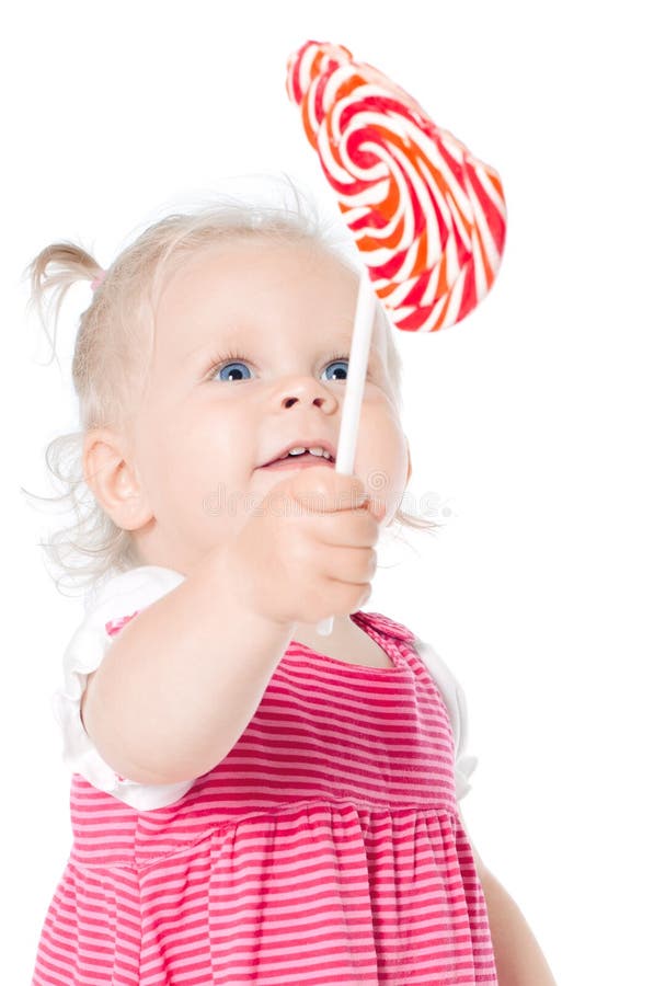 Girl eating candy stock photo. Image of eyes, funny, enjoyment - 20071048