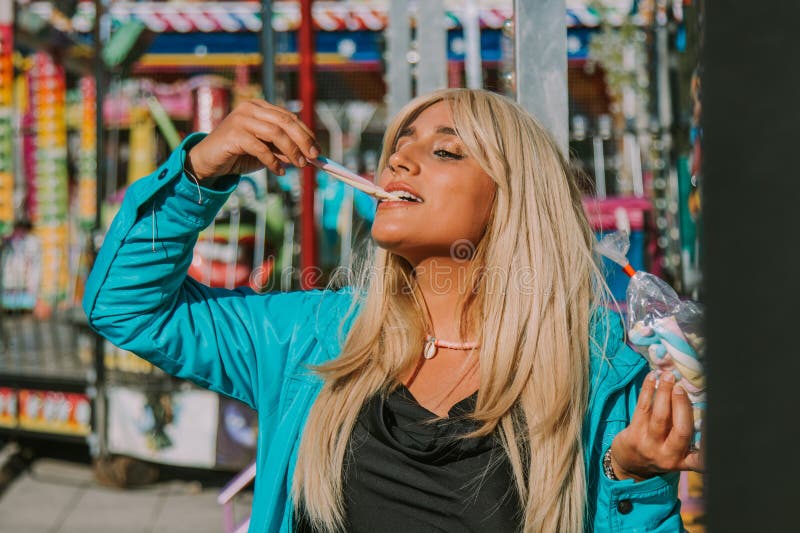 Girl eating candy stock photo. Image of insane, fatness - 275452166