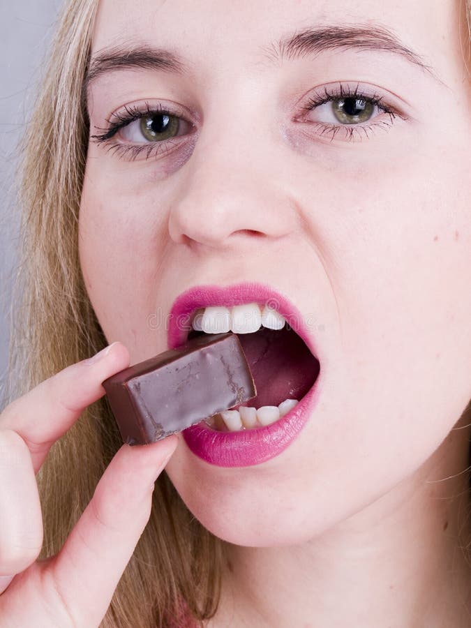 22+ Pretty blonde girl eating chocolate Free Stock Photos - StockFreeImages