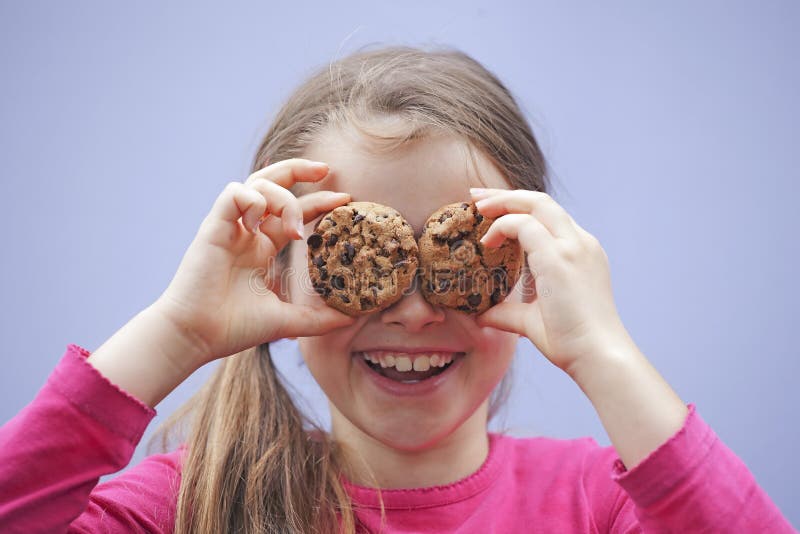 Girl Eating Chocolate Cookies Stock Image - Image of chip, nutrition ...