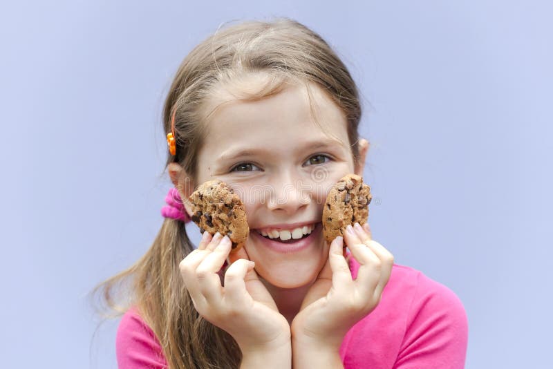 Girl Eating Chocolate Cookies Stock Image - Image of chip, nutrition ...