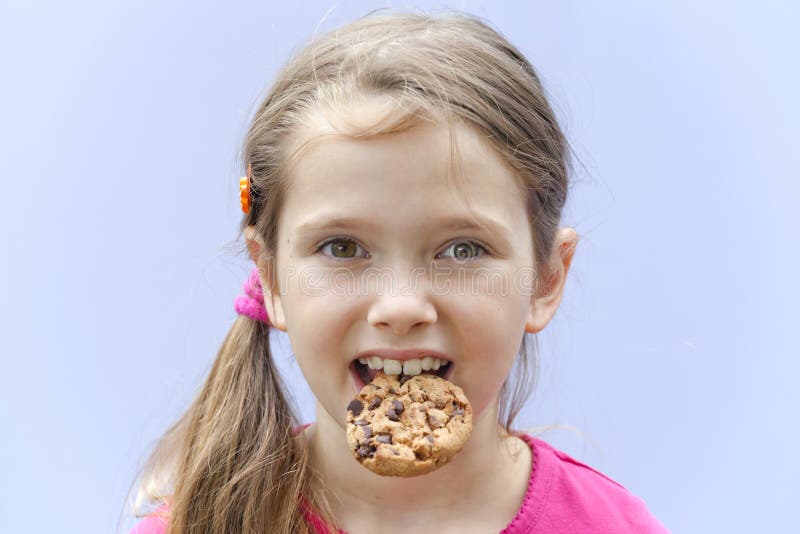 Girl Eating Chocolate Cookies Stock Image - Image of sweet, portrait ...