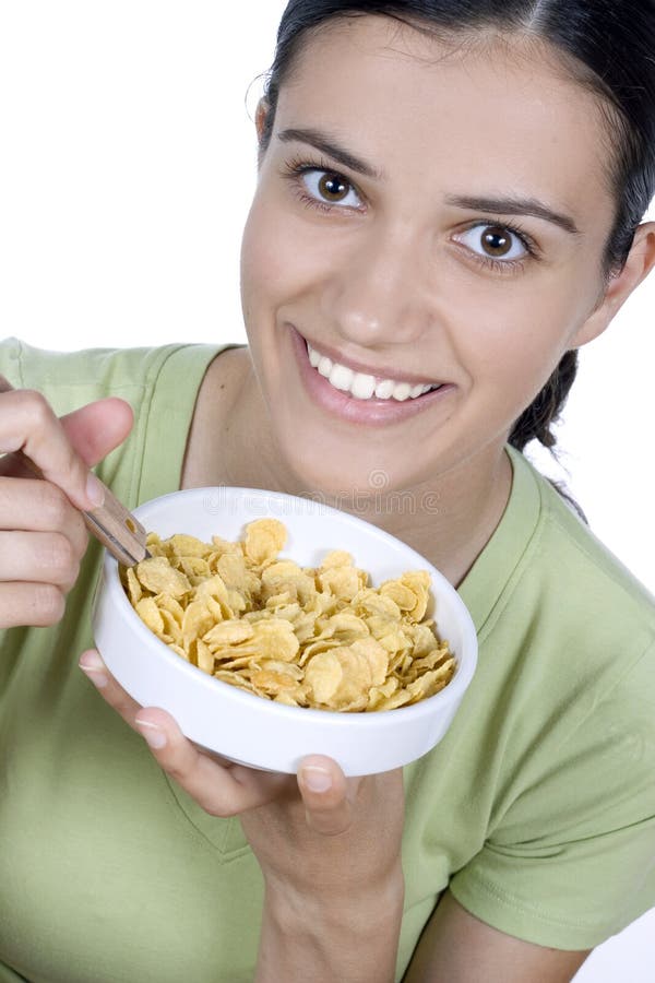 Girl eating cornflakes stock image. Image of fresh, feminine - 2523393