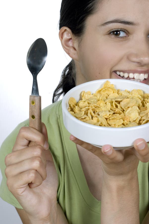Girl eating cornflakes stock photo. Image of care, beauty - 2523440