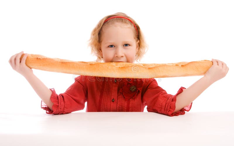 Hungry child eating bread stock image. Image of emotions - 44041255
