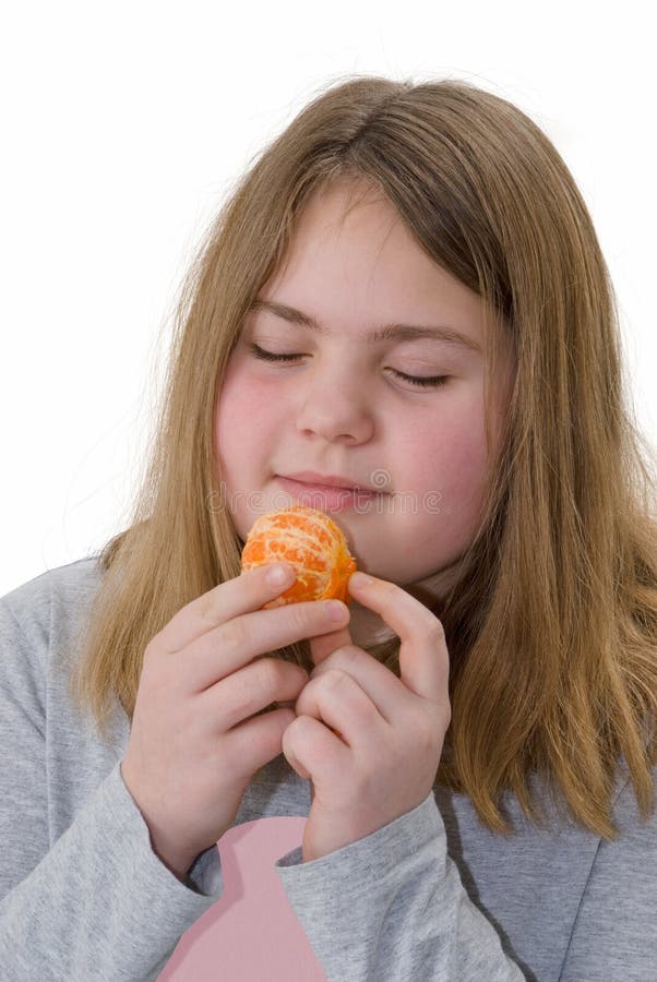 Girl Eating Orange stock image. Image of ripe, orange - 7328291