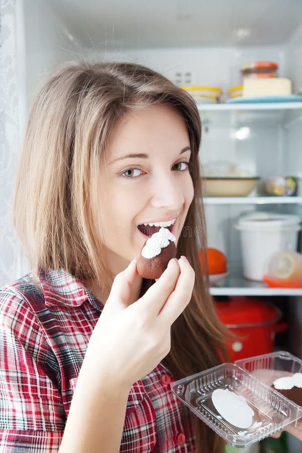 Girl Eating Pastry from Fridge Stock Image - Image of home, healthy ...