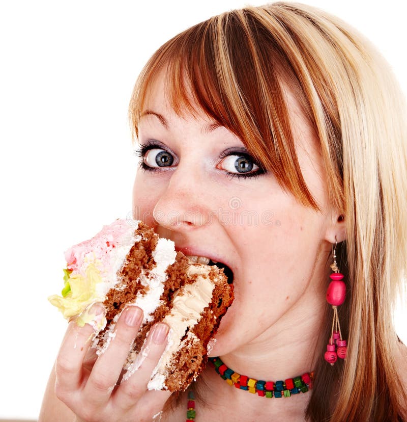 Girl eating piece of cake. stock image. Image of beauty - 12824469