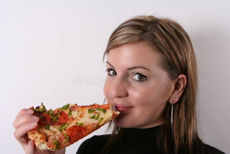 Girl eating pizza slice stock image. Image of pizza, food - 4764189