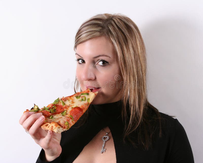Girl eating pizza slice stock photo. Image of food, eating - 4764194