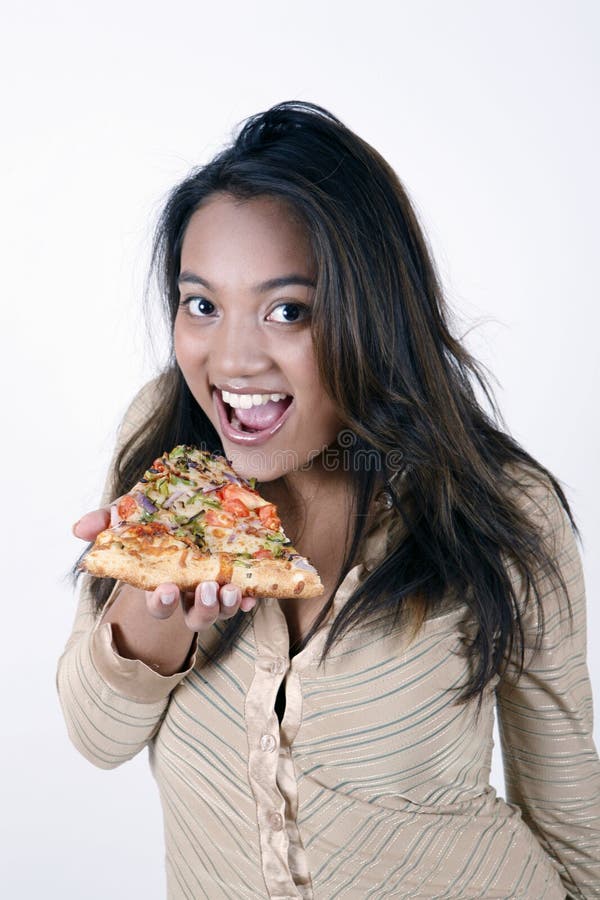 Girl eating pizza slice stock image. Image of mushrooms - 9303295