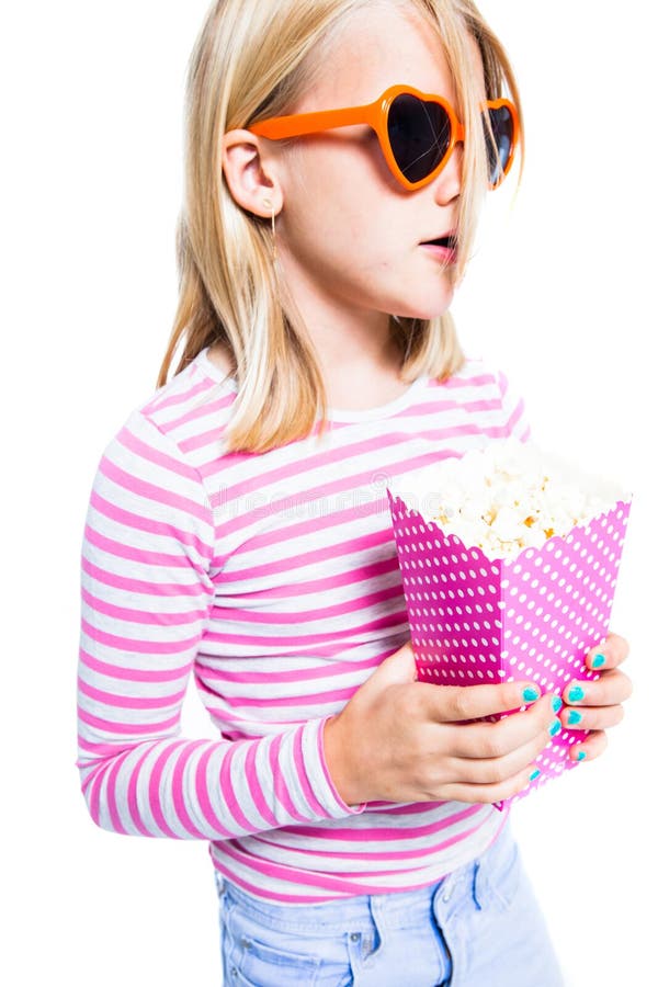 Girl eating pop corn stock image. Image of packet, expression - 53938807