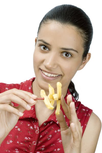 Girl eating potatoes stock image. Image of golden, dieting - 2586409