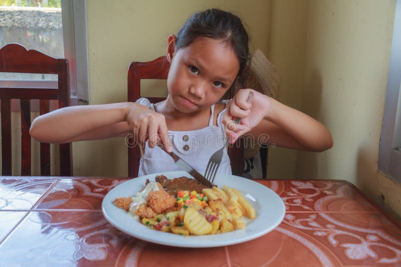 Girl eating Steak stock photo. Image of potatoes, delicious - 40792312