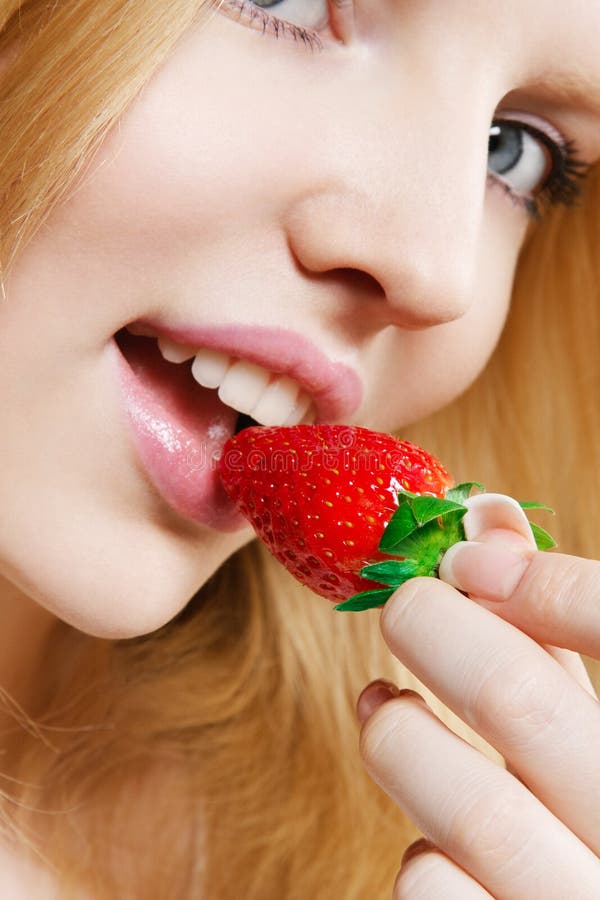 Girl Eating a Strawberry 02 Stock Photo - Image of fruit, adult: 2722796