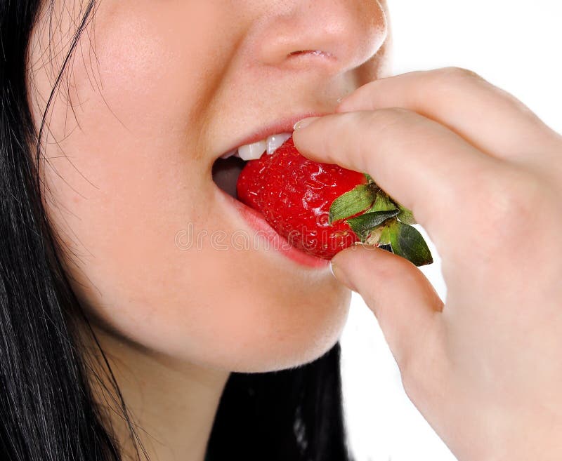 A Girl Eating A Strawberry Picture. Image: 4477812