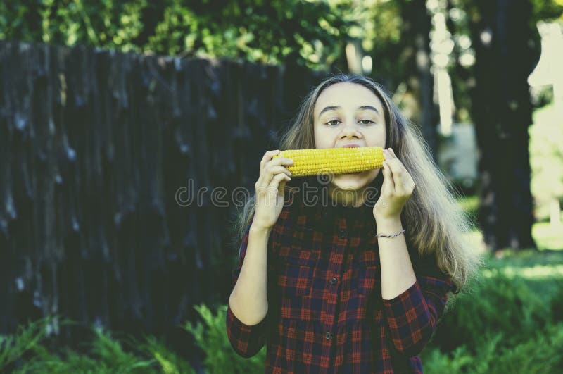 Girl eating sweet corn stock photo. Image of summer, children - 86613044