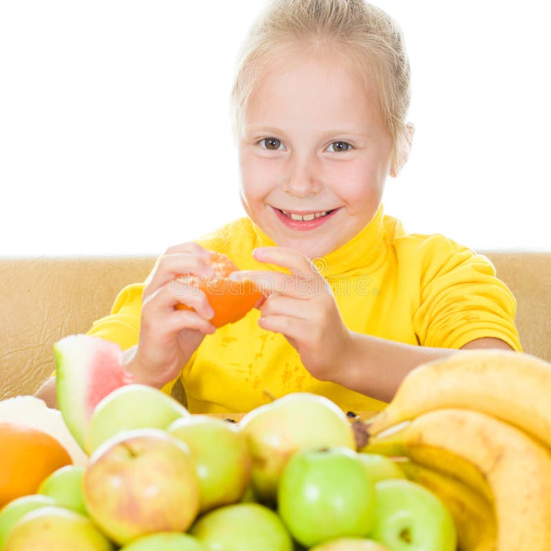 Girl eats fruit stock photo. Image of childhood, hungry - 28596356