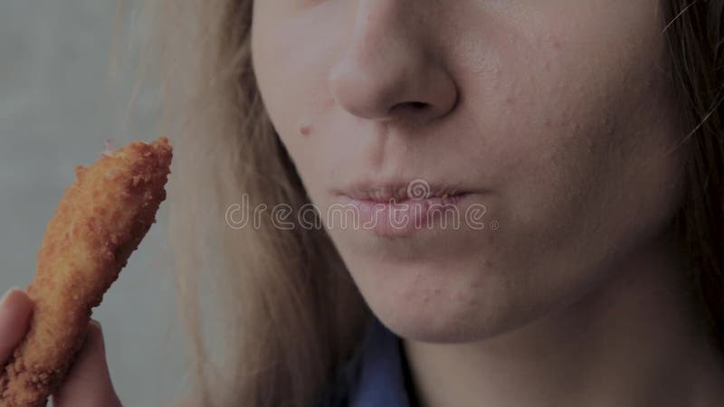 Beautiful Girl Eats a Burger. Fast Food Restaurant Stock Footage ...