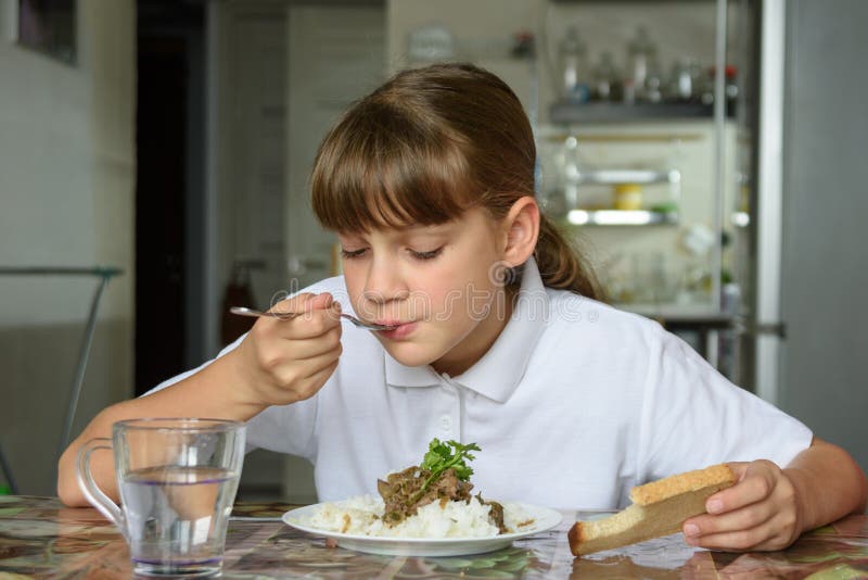 Girl Eats the Second Dish for Lunch Stock Photo - Image of authentic ...