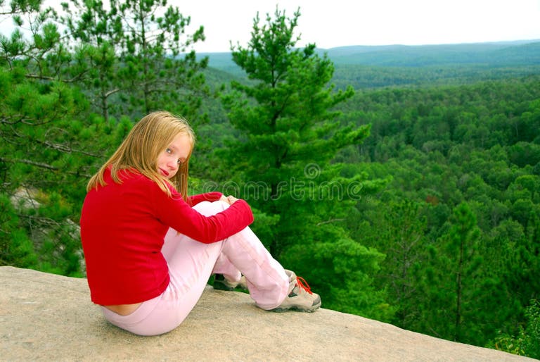 Girl edge cliff stock photo. Image of mountains, people - 1327908