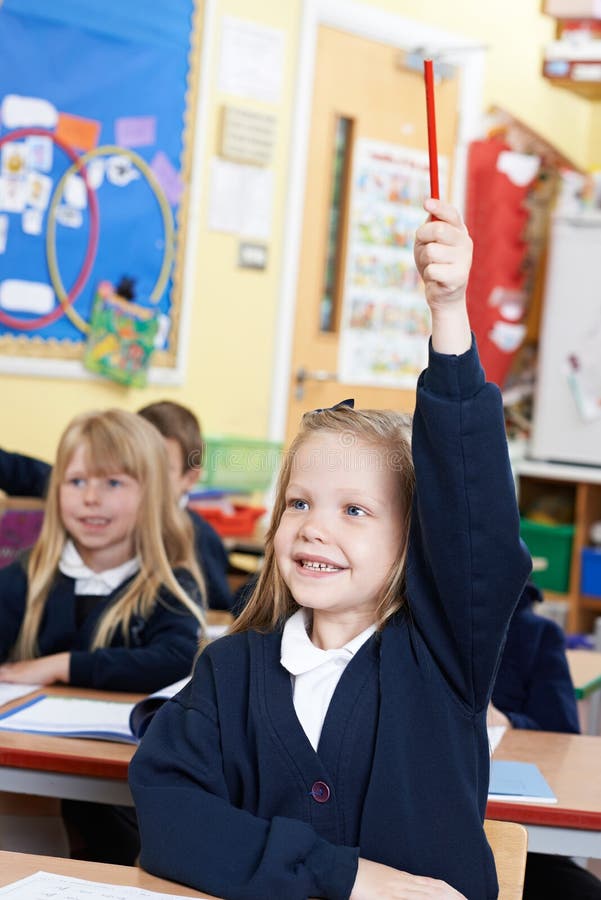 Girl in Elementary School Class Answering Question Stock Image - Image ...