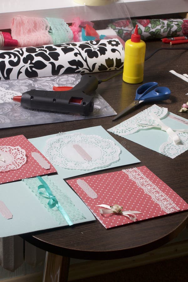 The Girl is Engaged in Making Greeting Cards at Home. Using Paper, Lace ...