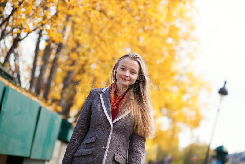 Girl enjoying a fall day stock image. Image of parisian - 32090655