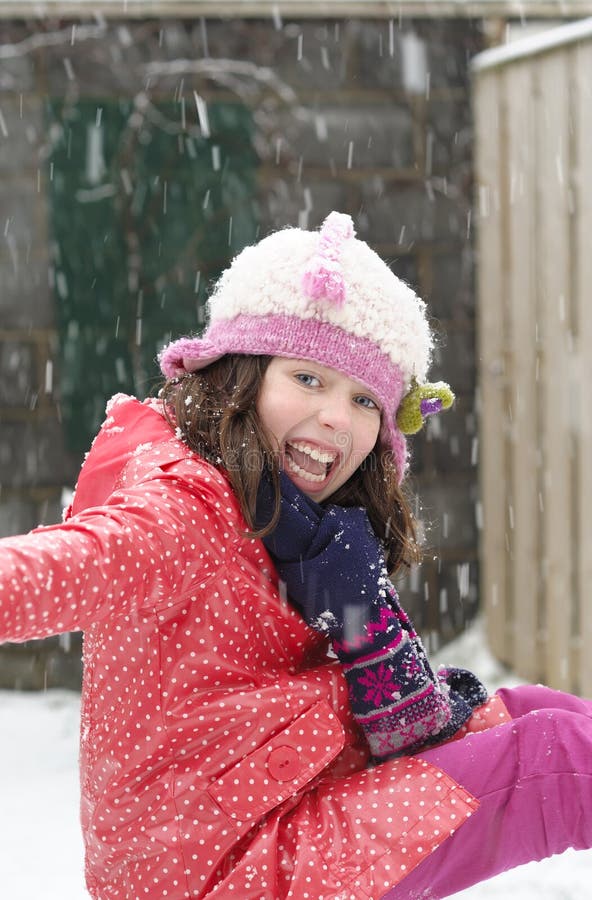 Girl enjoying the snow stock image. Image of cold, winter - 13496413