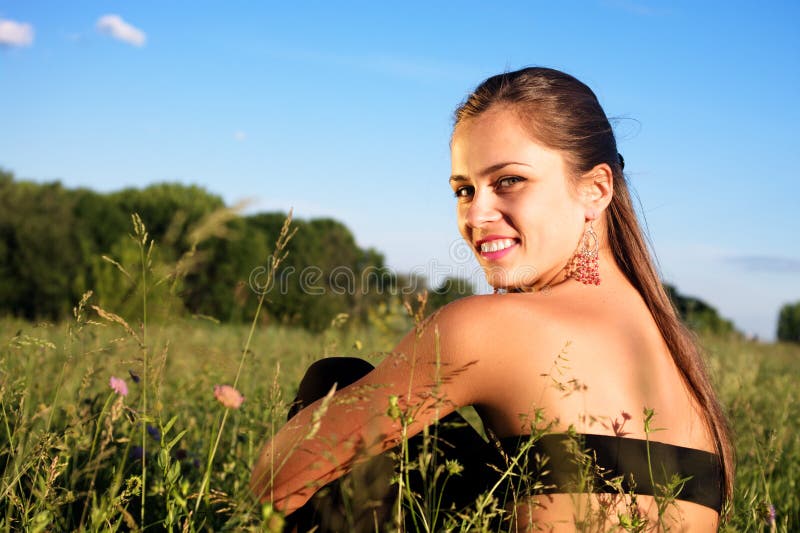 Girl Enjoying the Summer Sitting on Stock Image - Image of back ...