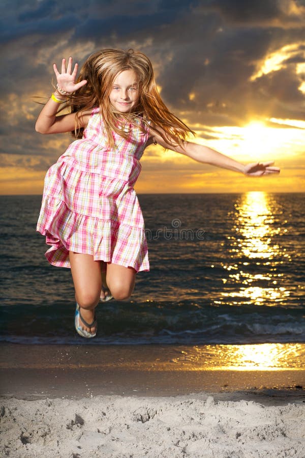 Girl Enjoys Summer Day at the Beach. Stock Photo - Image of female ...