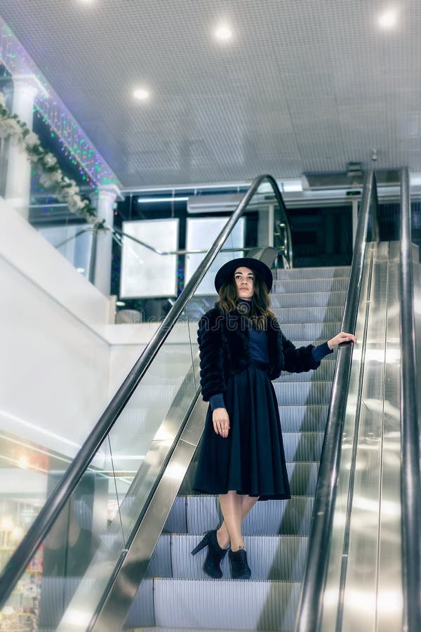 The Girl on an Escalator in a Big Store Stock Image - Image of discount ...