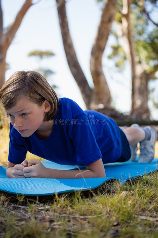 Girl Exercising on Exercise Mat during Obstacle Course Training Stock ...