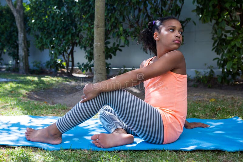 Girl Exercising on Exercise Mat Stock Photo - Image of female, shoulder ...
