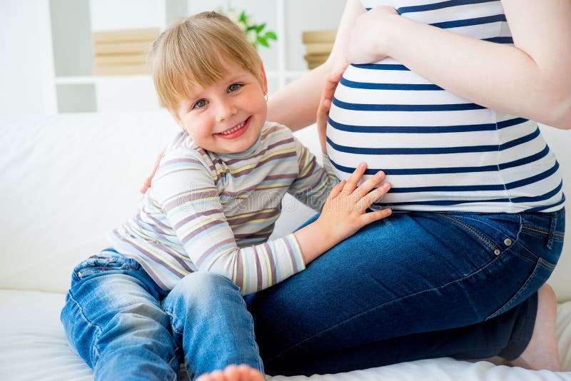 Girl expecting a sister stock image. Image of love, belly - 98278535