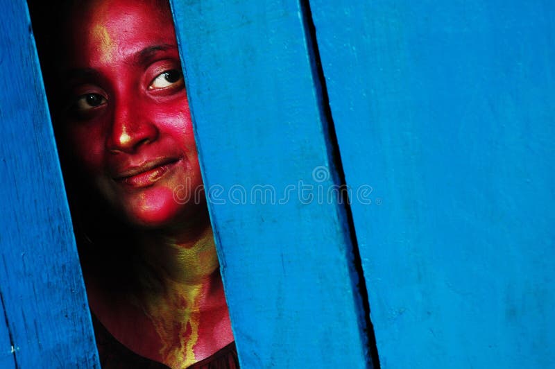 A GIRL FACE SMEARED with COLOUR. Editorial Stock Image - Image of ...