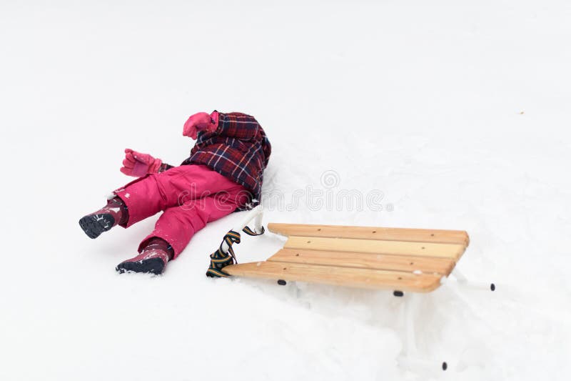 Girl Falling Down from Sledge in Winter Park Stock Image - Image of ...